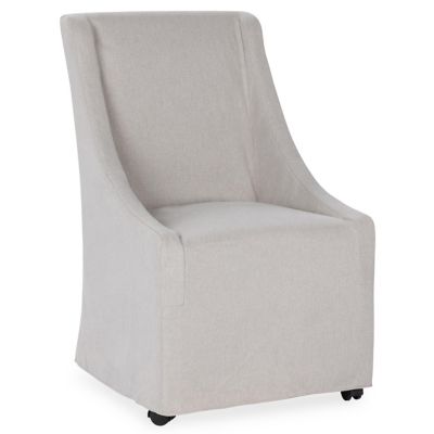 Warwick Upholstered Rolling Dining Chair by Classic Home at Lumens.com